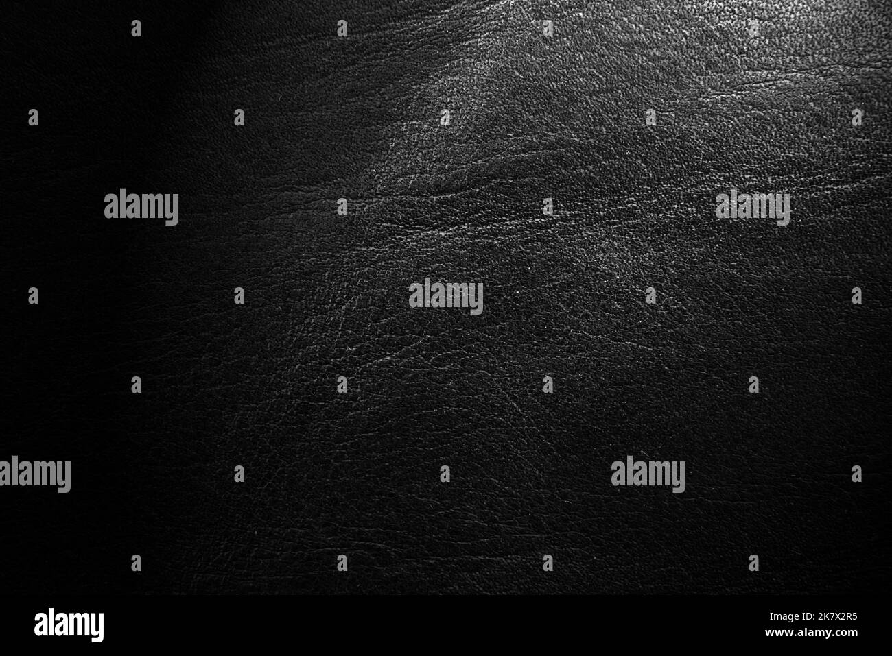 Black leather texture. Abstract background of dark leather with small ...