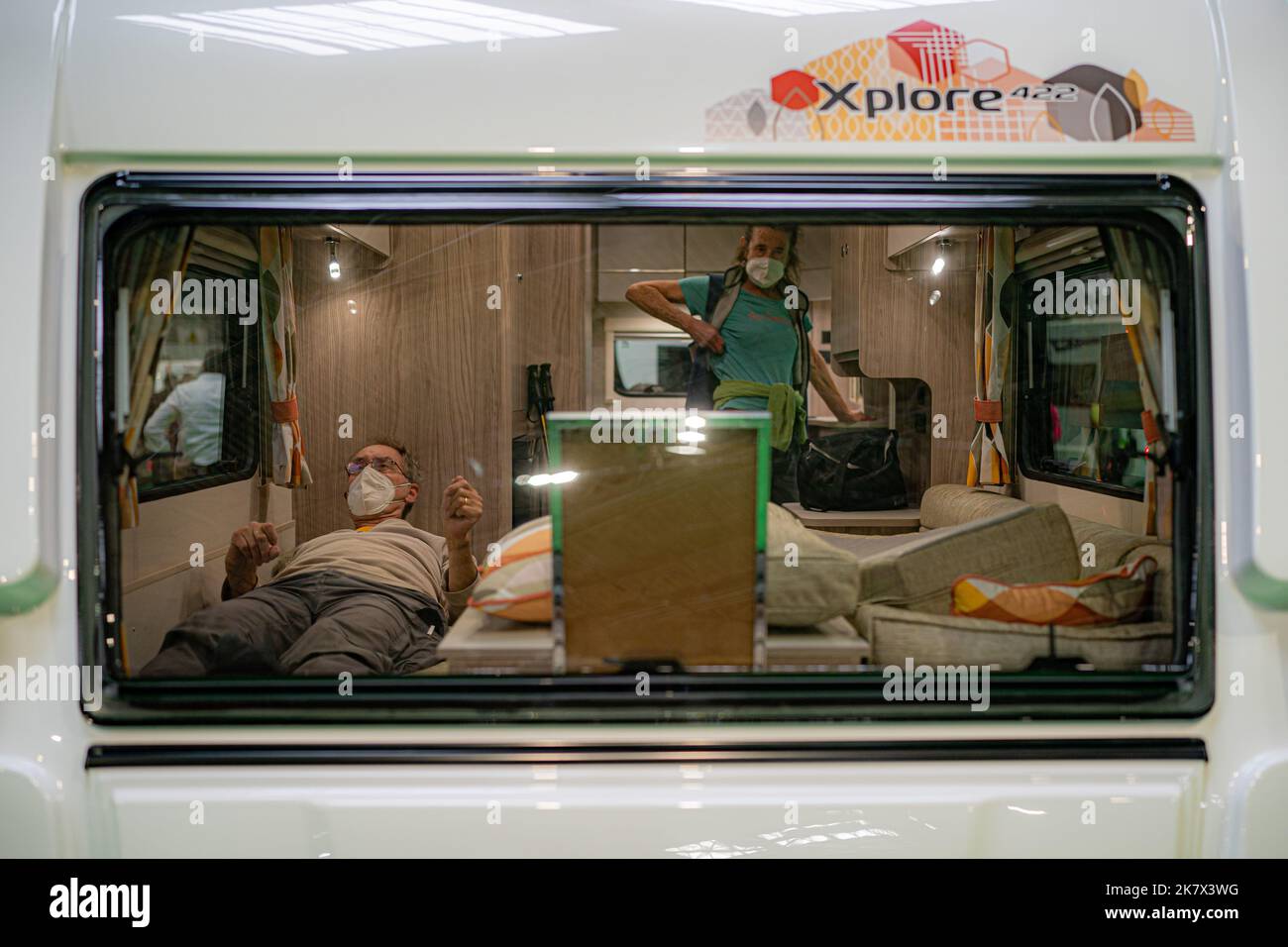 People try out the size of the beds inside a caravan at the Motorhome ...