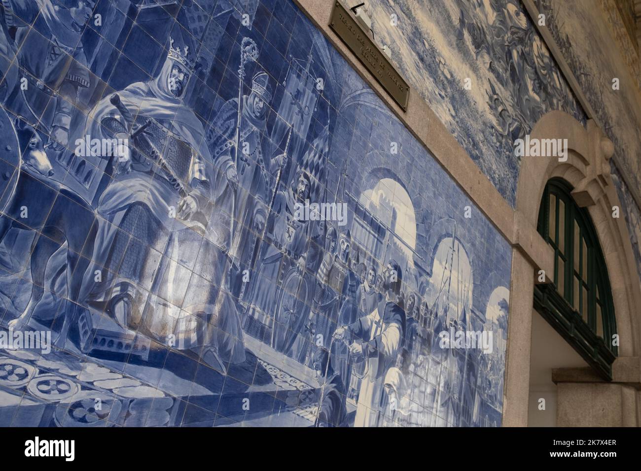 Tourists in Sao Bento train station photographing the blue tile murals ...