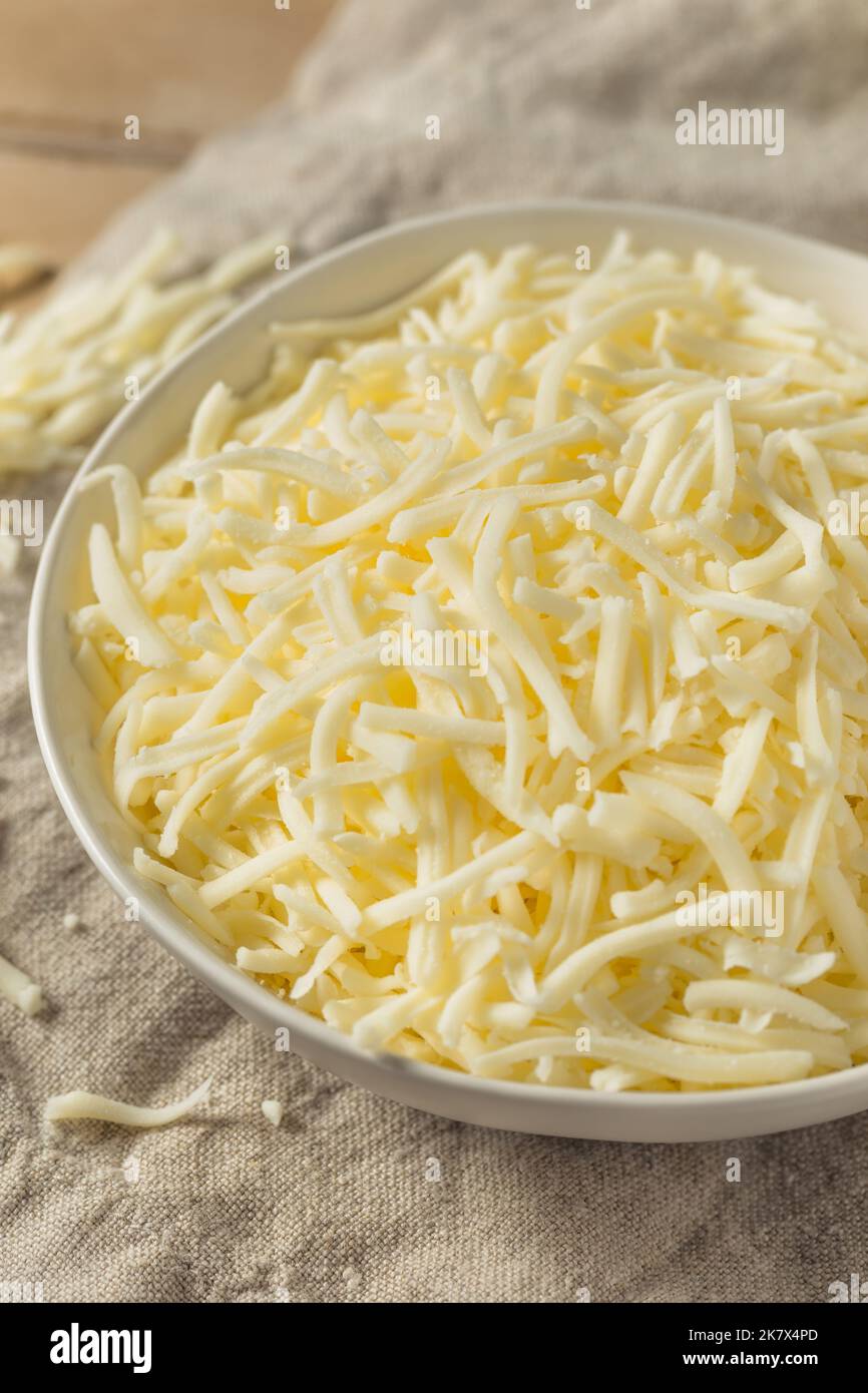 Organic Shredded Mozzarella Cheese in a Bowl Stock Photo - Alamy