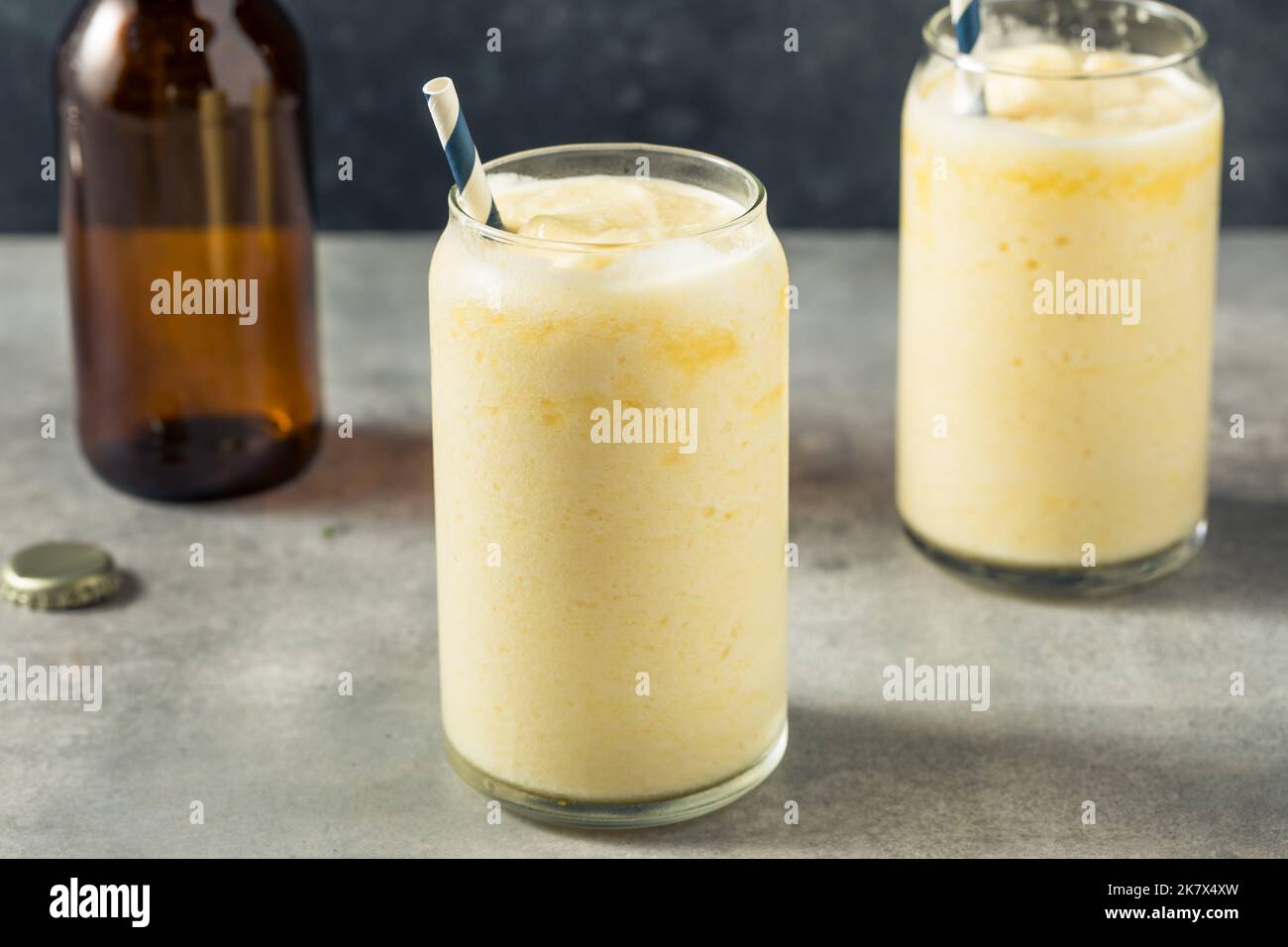 Boozy Frozen Beer Slushie with a Straw Stock Photo - Alamy
