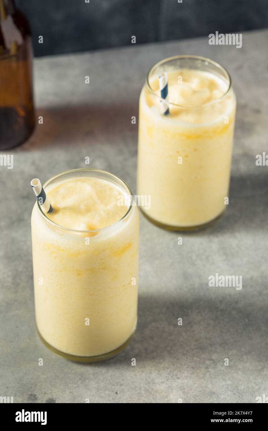 Boozy Frozen Beer Slushie with a Straw Stock Photo - Alamy