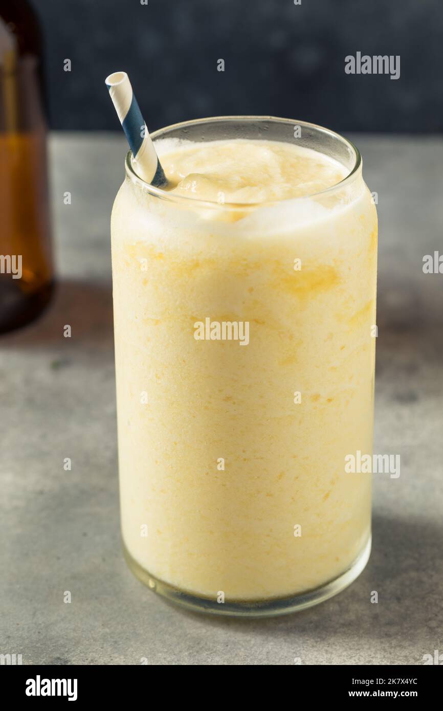 Boozy Frozen Beer Slushie with a Straw Stock Photo - Alamy