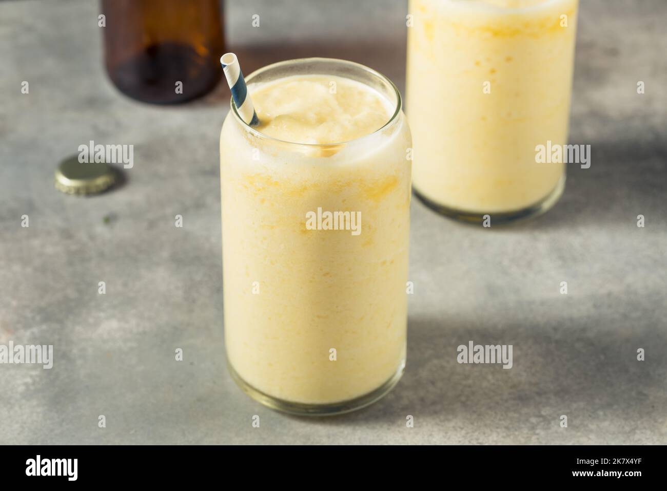 Boozy Frozen Beer Slushie with a Straw Stock Photo - Alamy