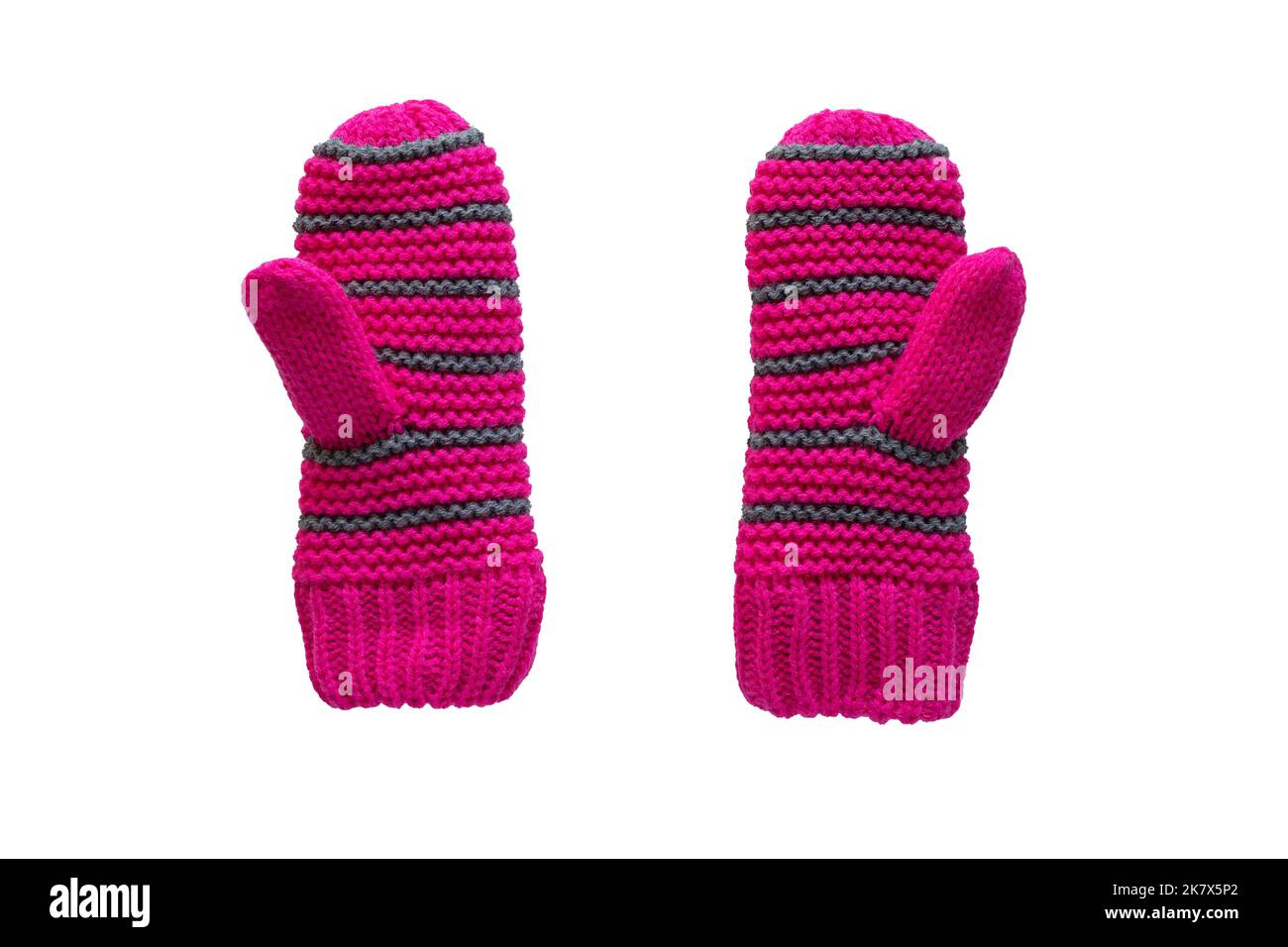 Pair of pink knitted winter mittens for children isolated on white ...