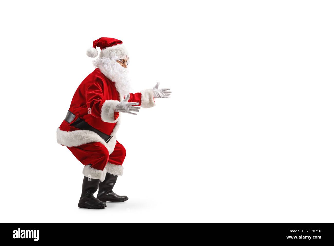 Full length profile shot of santa claus waiting to hug somebody ...