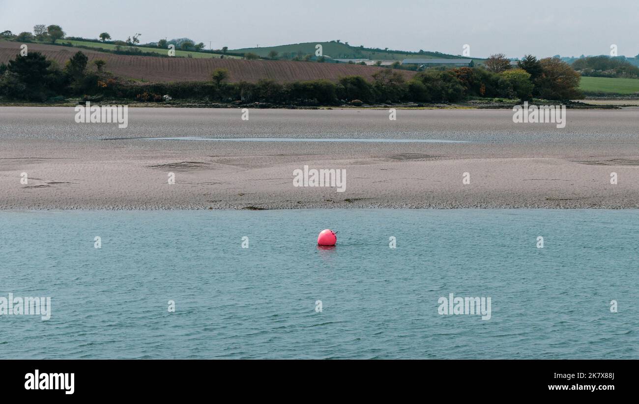 An sea buoy on the surface of the water. Seascape. Calm water surface ...