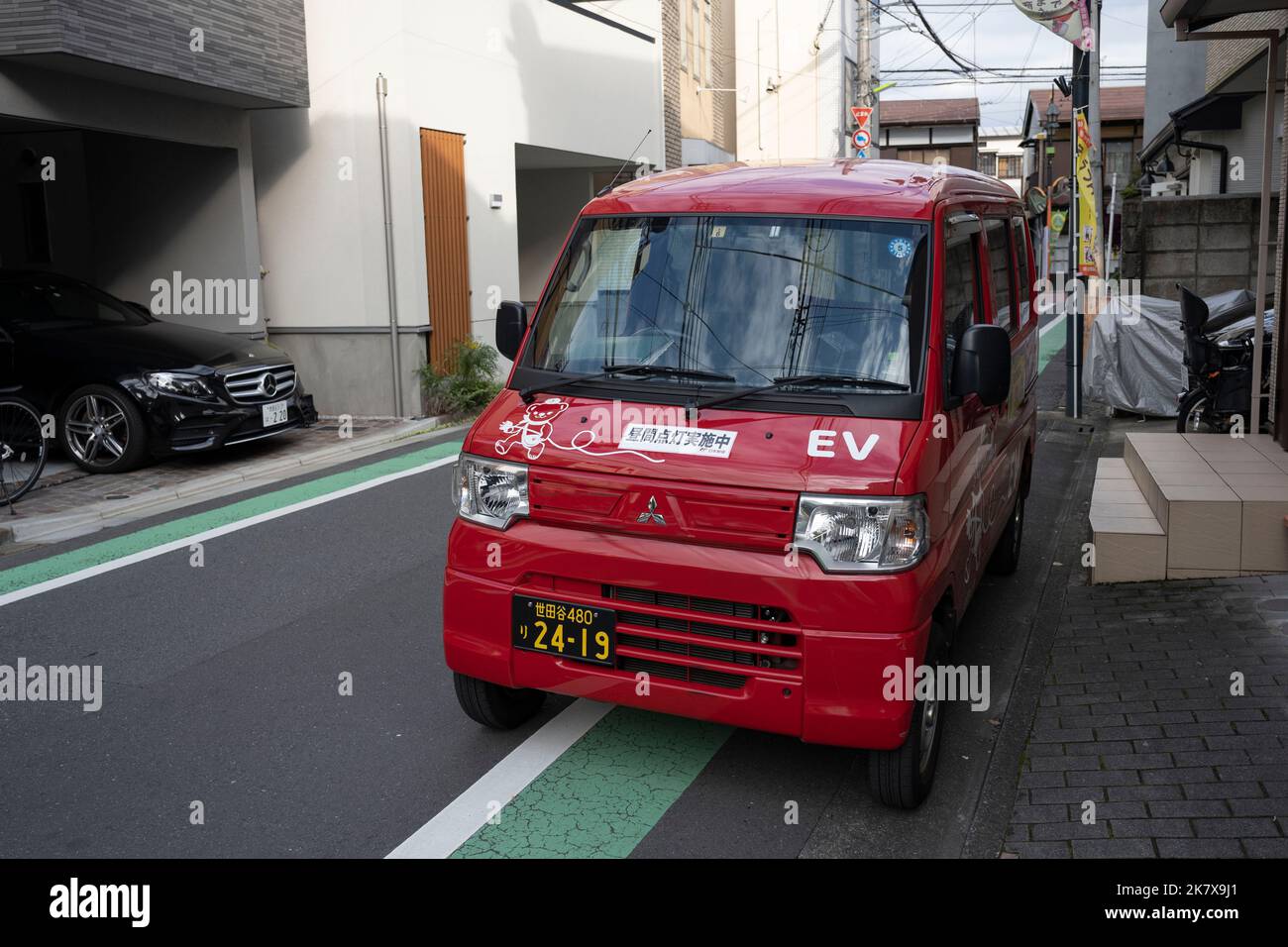 Tokyo, Japan. 19th Oct, 2022. A Tokyo Post EV electric vehicle mail ...