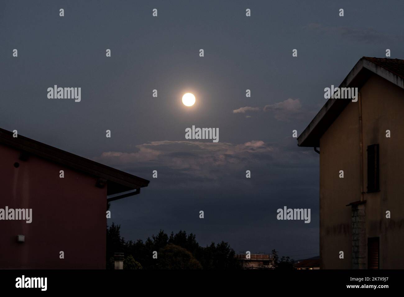 Shining moon in the cloudy sky Stock Photo - Alamy