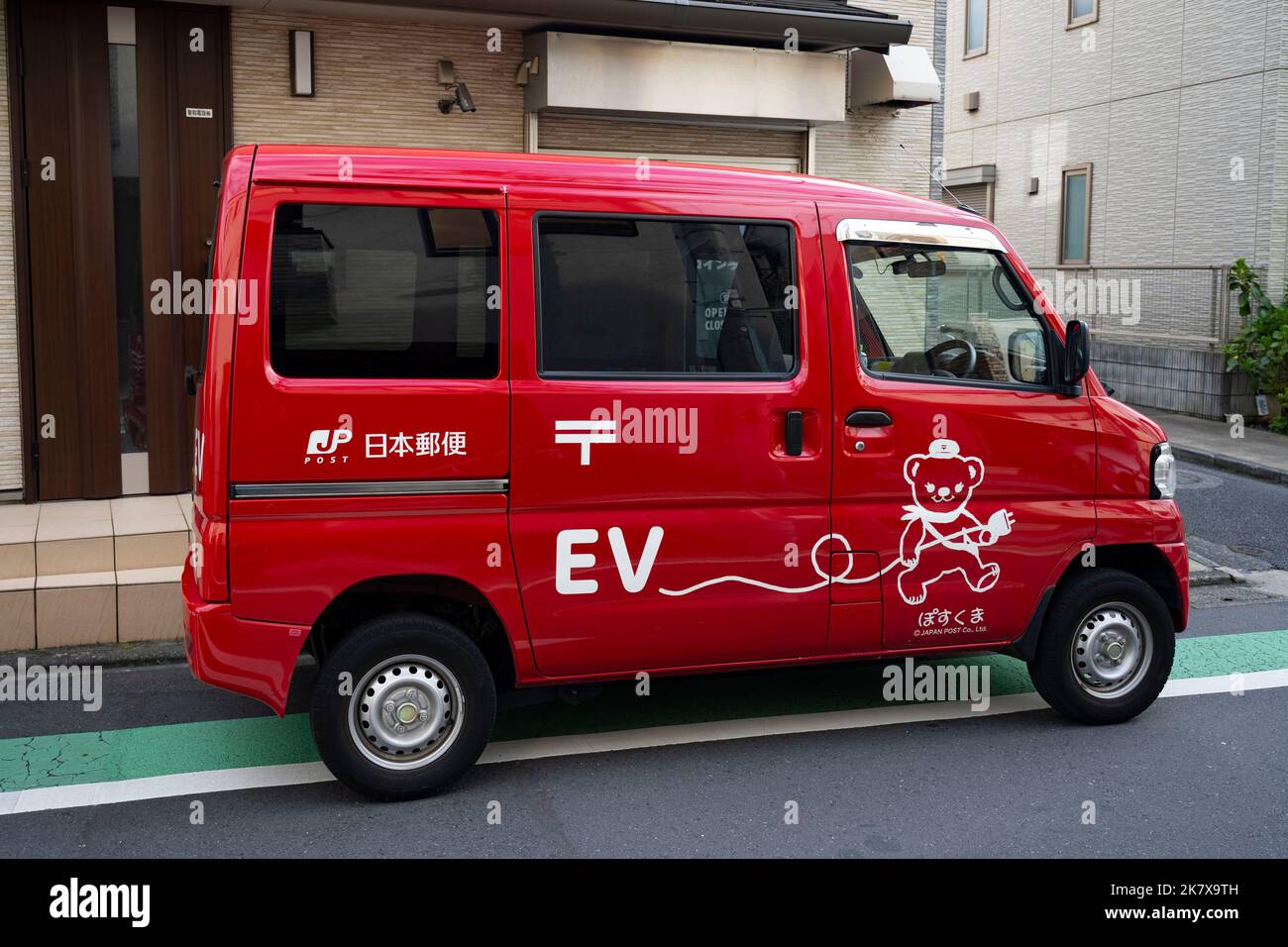 Tokyo, Japan. 19th Oct, 2022. A Tokyo Post EV electric vehicle mail ...