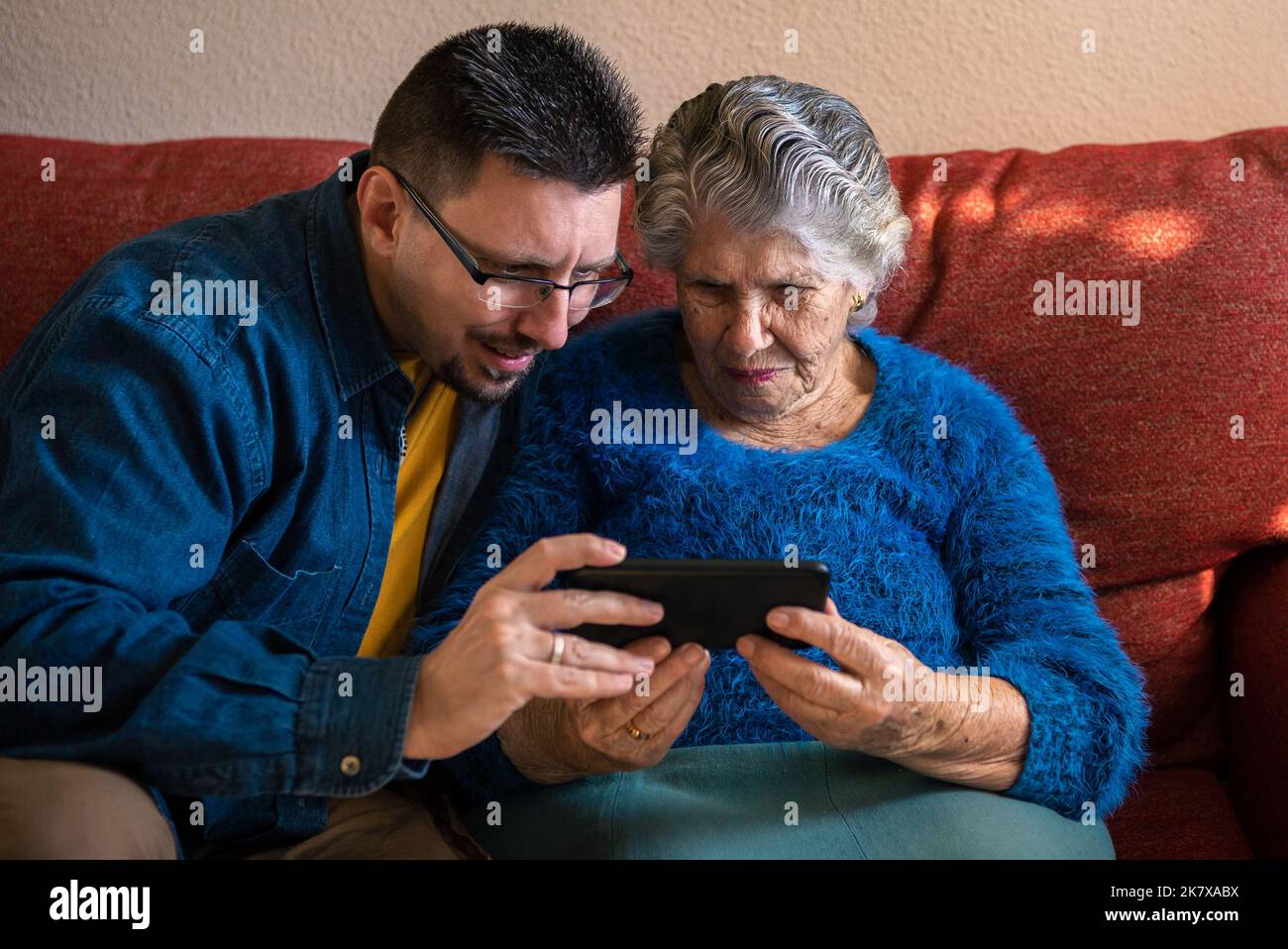 Grandmother speaking with grandson hi-res stock photography and images ...