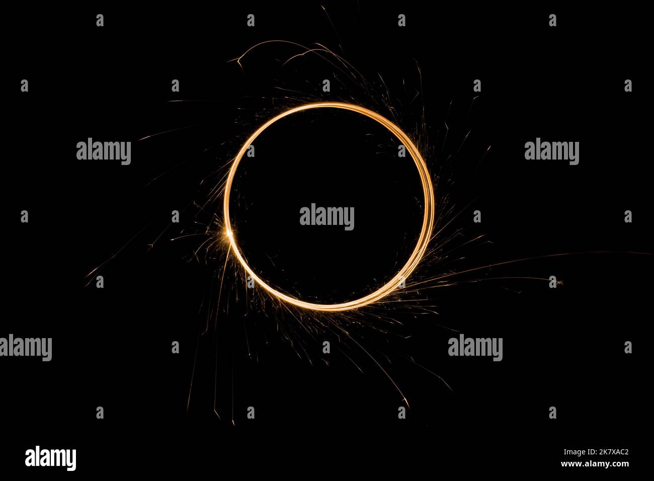 Sparks from the circular rotation of lights on a black background Stock ...