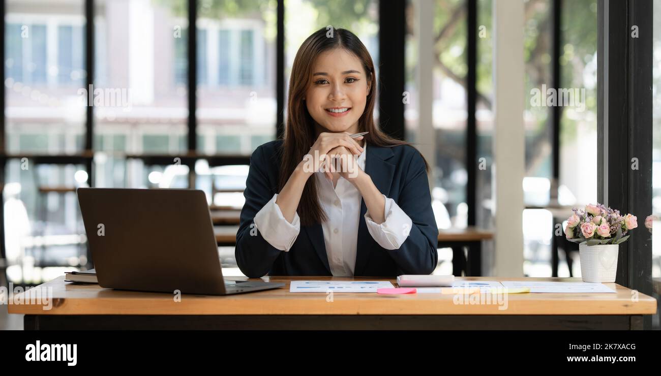 Consult financial concept. Business man pointing at paperwork and using ...