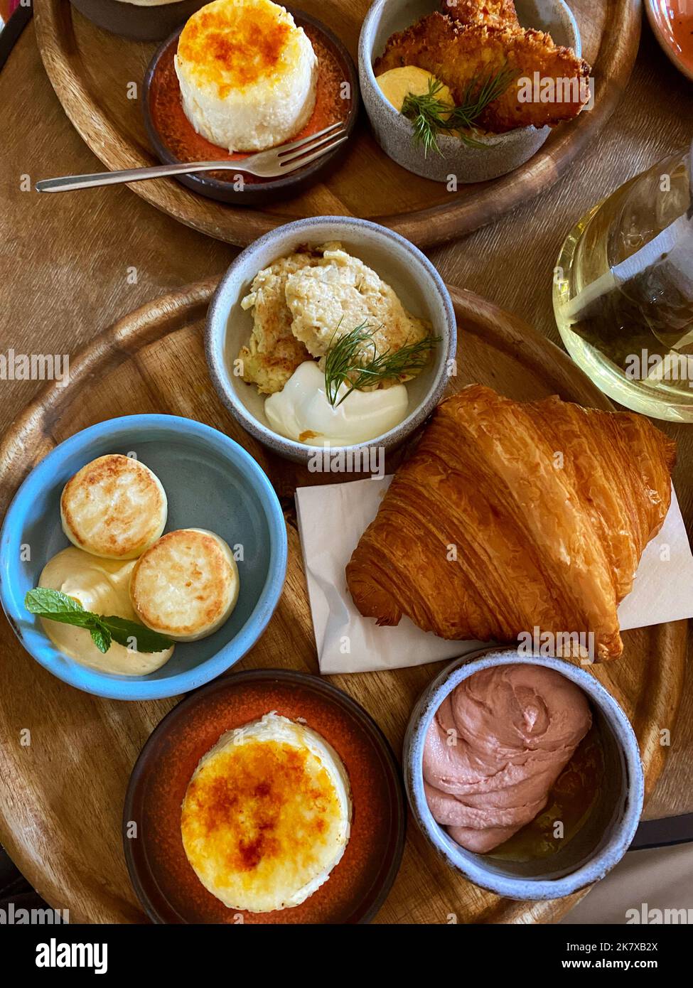 Brunch table setting with different delicious food indoors, top view ...