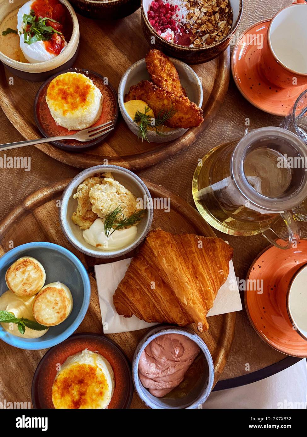 Brunch table setting with different delicious food indoors, top view ...