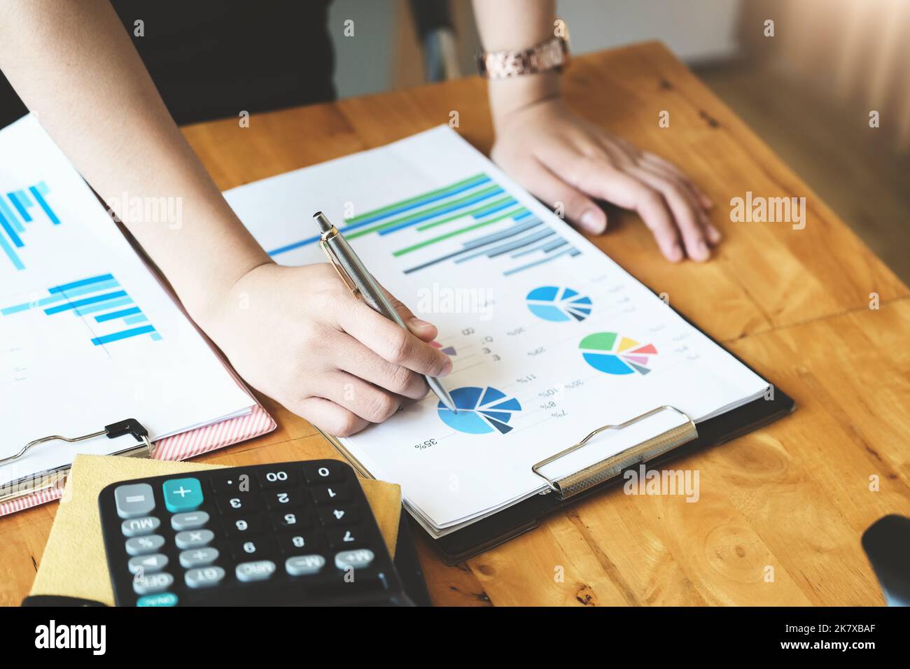 Business woman pen point document to review balance sheet annual to ...