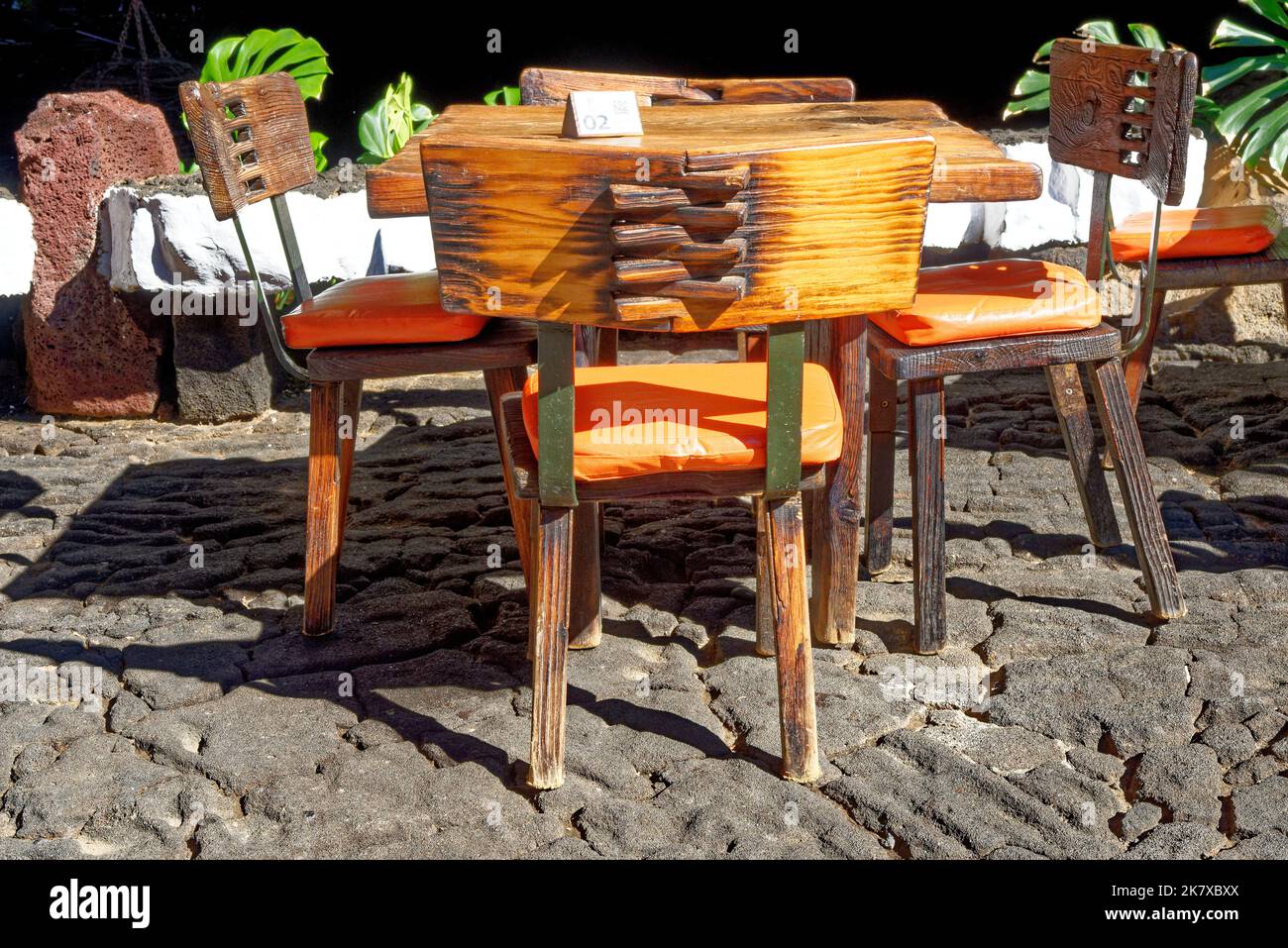 Tables at the Jameos del Agua are part of a 6 Km long lava tube which ...