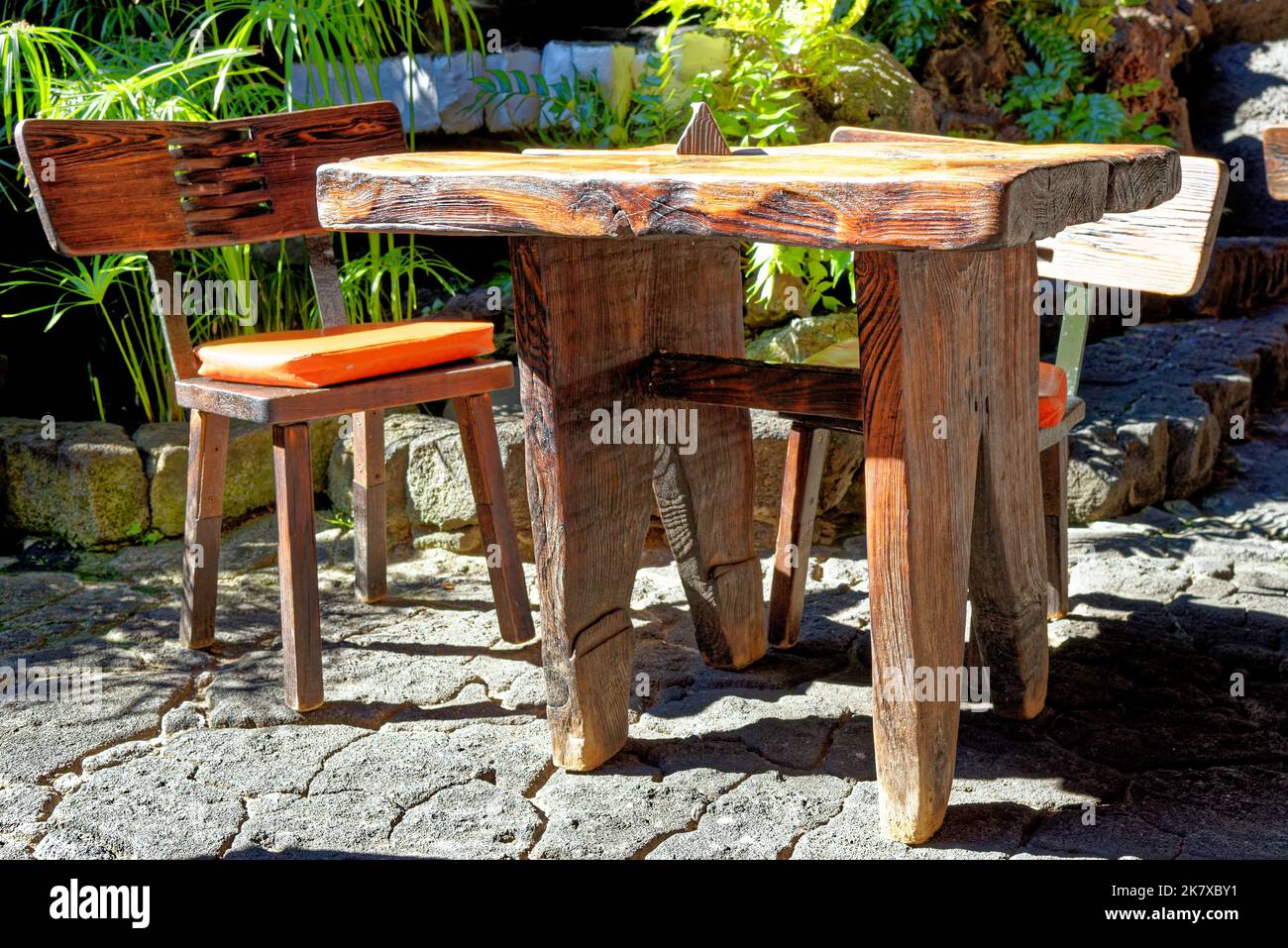 Tables at the Jameos del Agua are part of a 6 Km long lava tube which ...