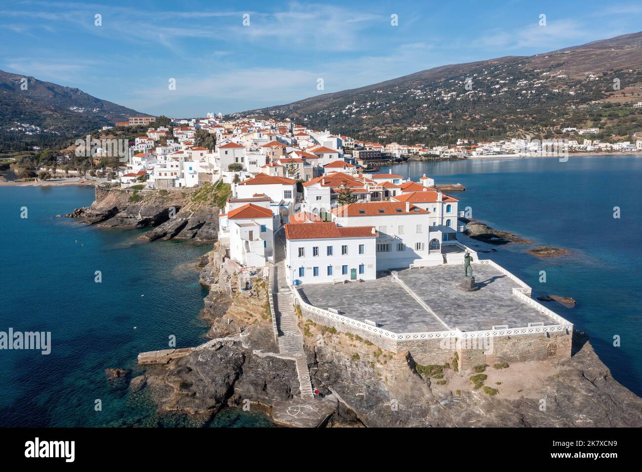Greece. Andros island, Cyclades. Traditional whitewashed buildings with ...