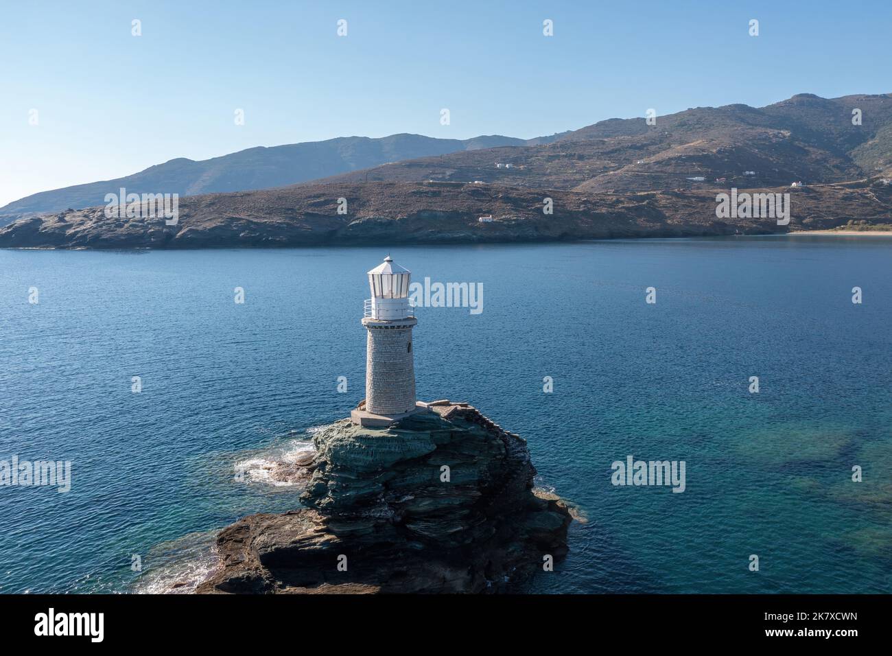 Greece. Andros Island. The stone beacon on a rock aerial drone view ...