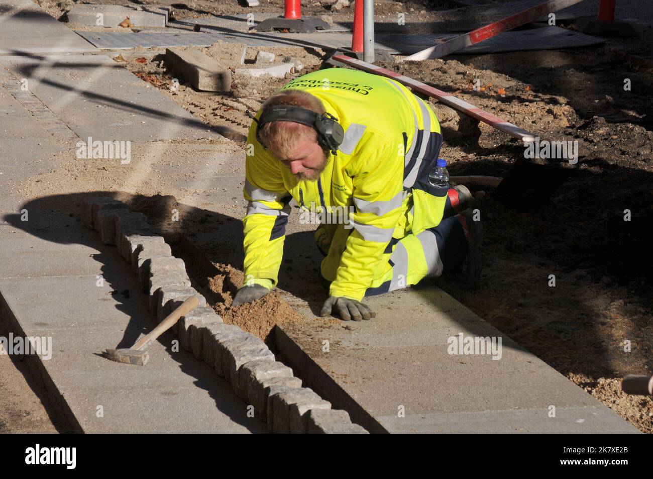 Copenhagen/Denmark/19 OIctober 2022/Male bricklayer in working process ...