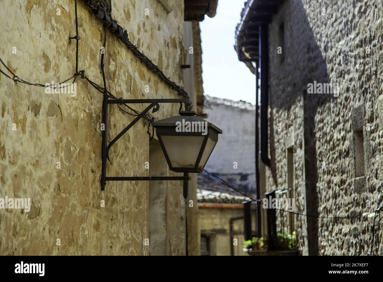 Detail of artificial lighting in an old medieval street Stock Photo - Alamy