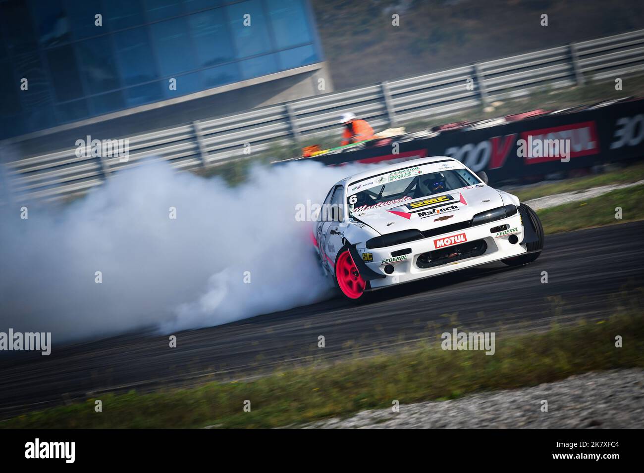 Drifting motorsport competition a spectacle all sideways, smoking tyres ...