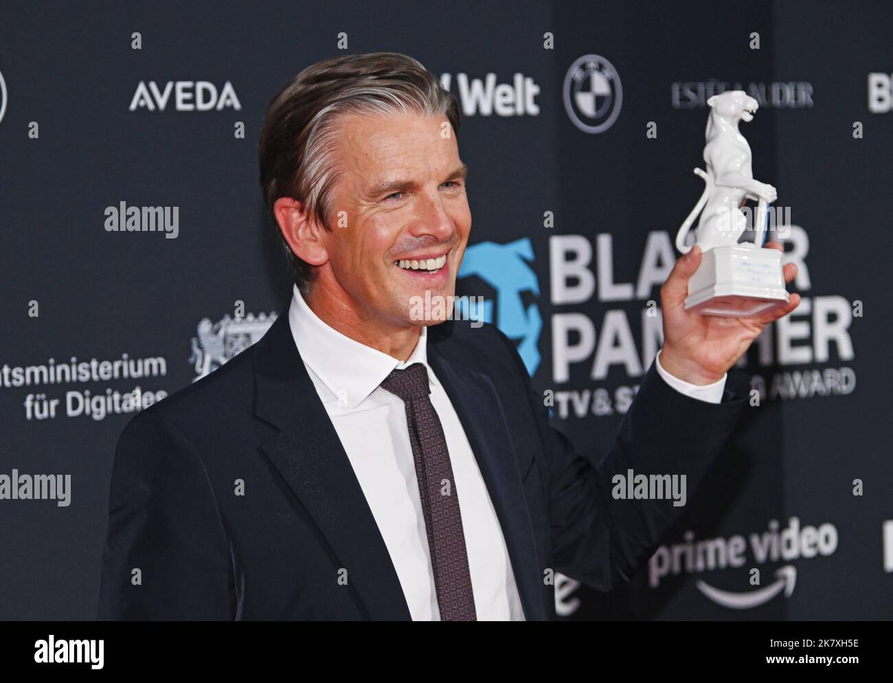 Munich, Germany. 19th Oct, 2022. Presenter Markus Lanz holds his award ...