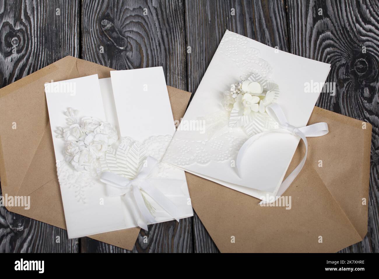 Homemade greeting card in white. With decorative elements. Ribbons ...