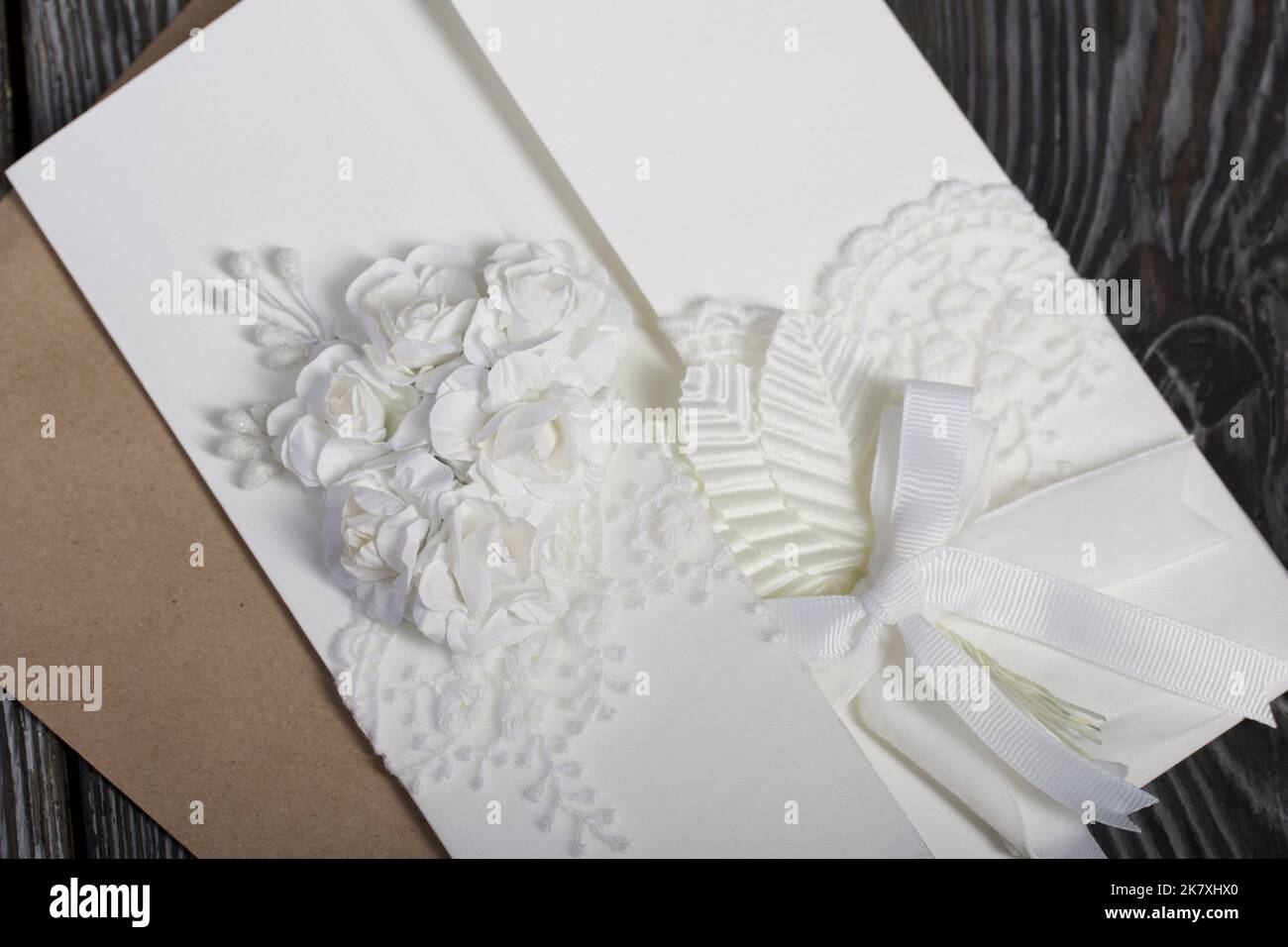 Homemade greeting card in white. With decorative elements. Ribbons ...