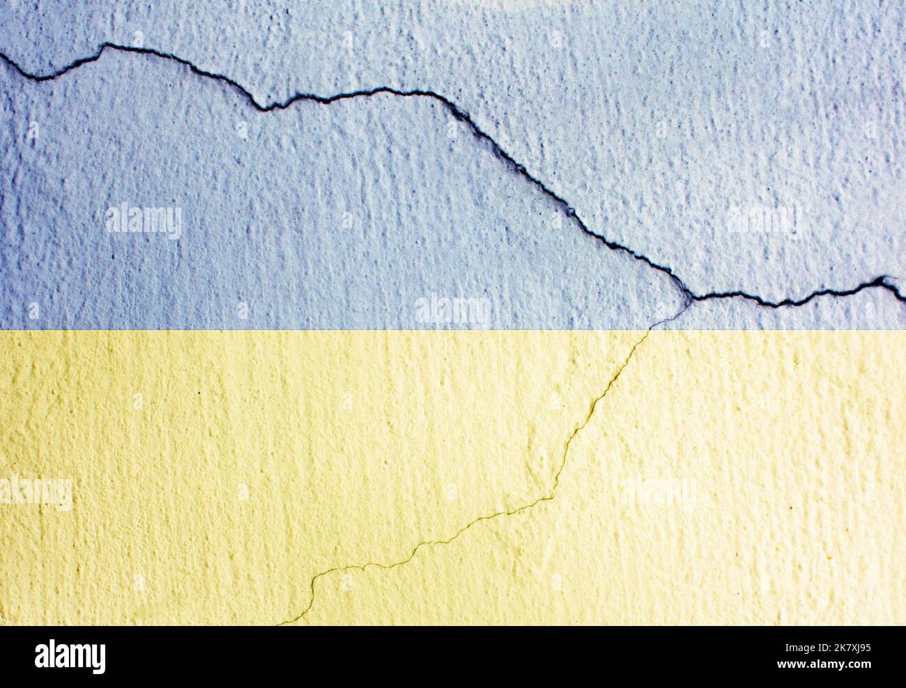 wall with ukrainian blue-yellow colors, cracking wall. Blue and yellow ...