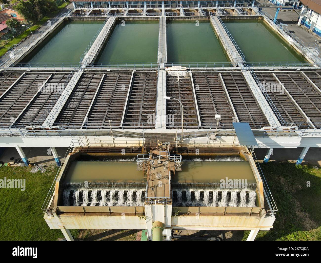 Water treatment facility with several filtration pools. Aerial drone ...