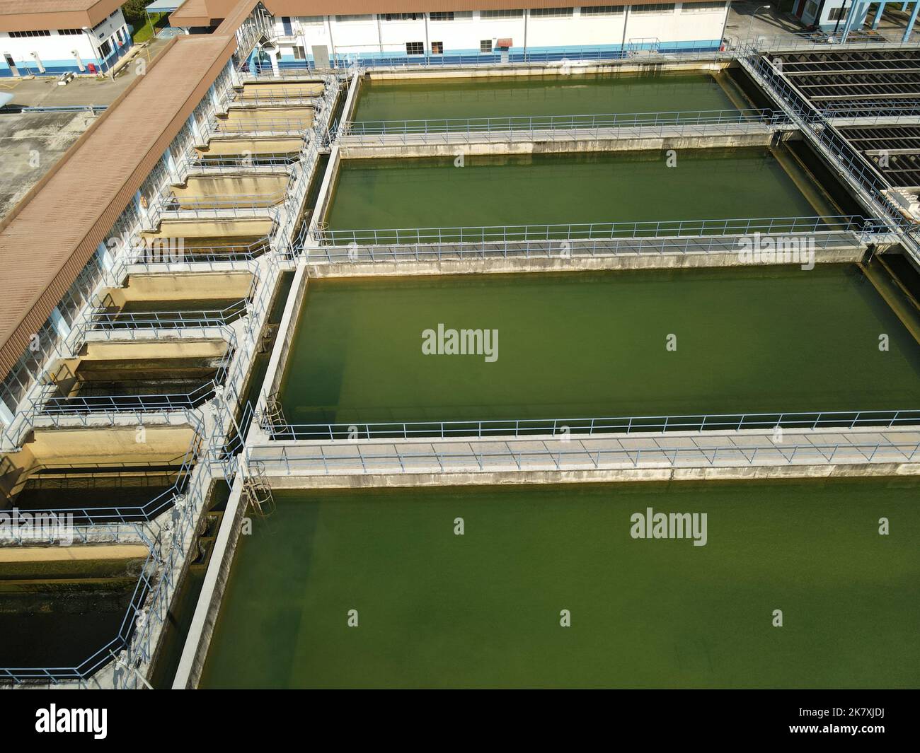 Water treatment facility with several filtration pools. Aerial drone ...