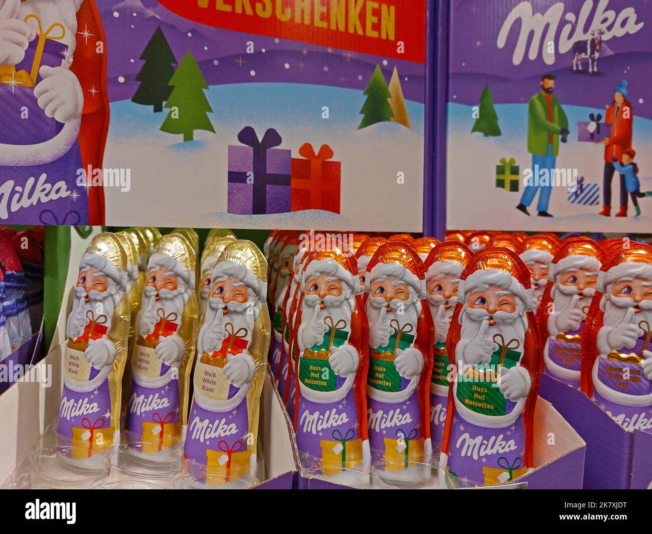 group of Milka chocolate Santa Claus figures in a supermarket Stock ...
