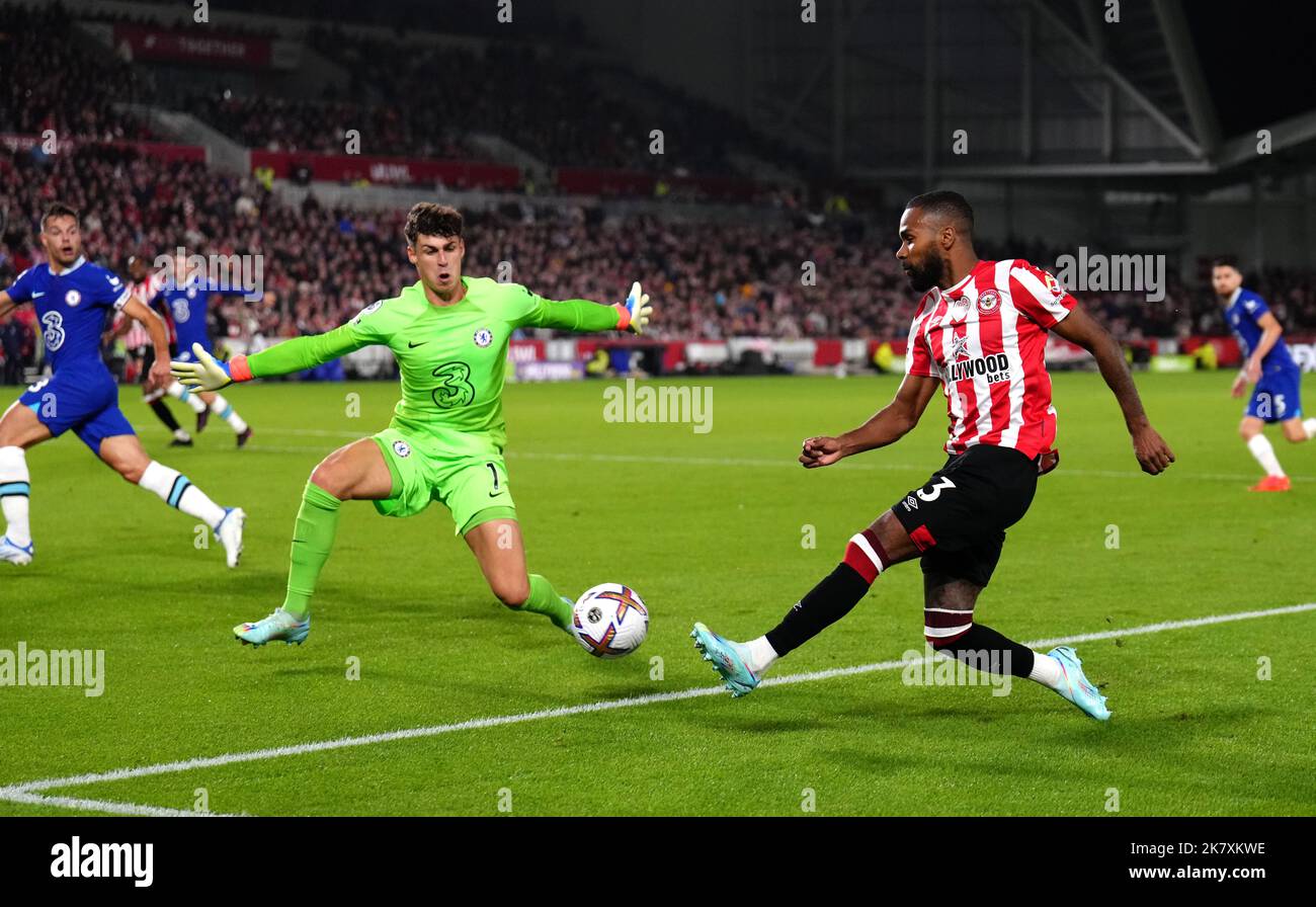 Brentford's Rico Henry tries to beat Chelsea goalkeeper Kepa ...