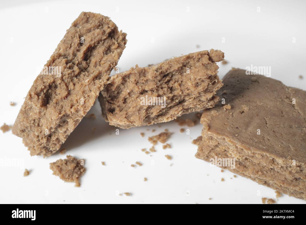 Sunflower halva isolated on white background Stock Photo - Alamy