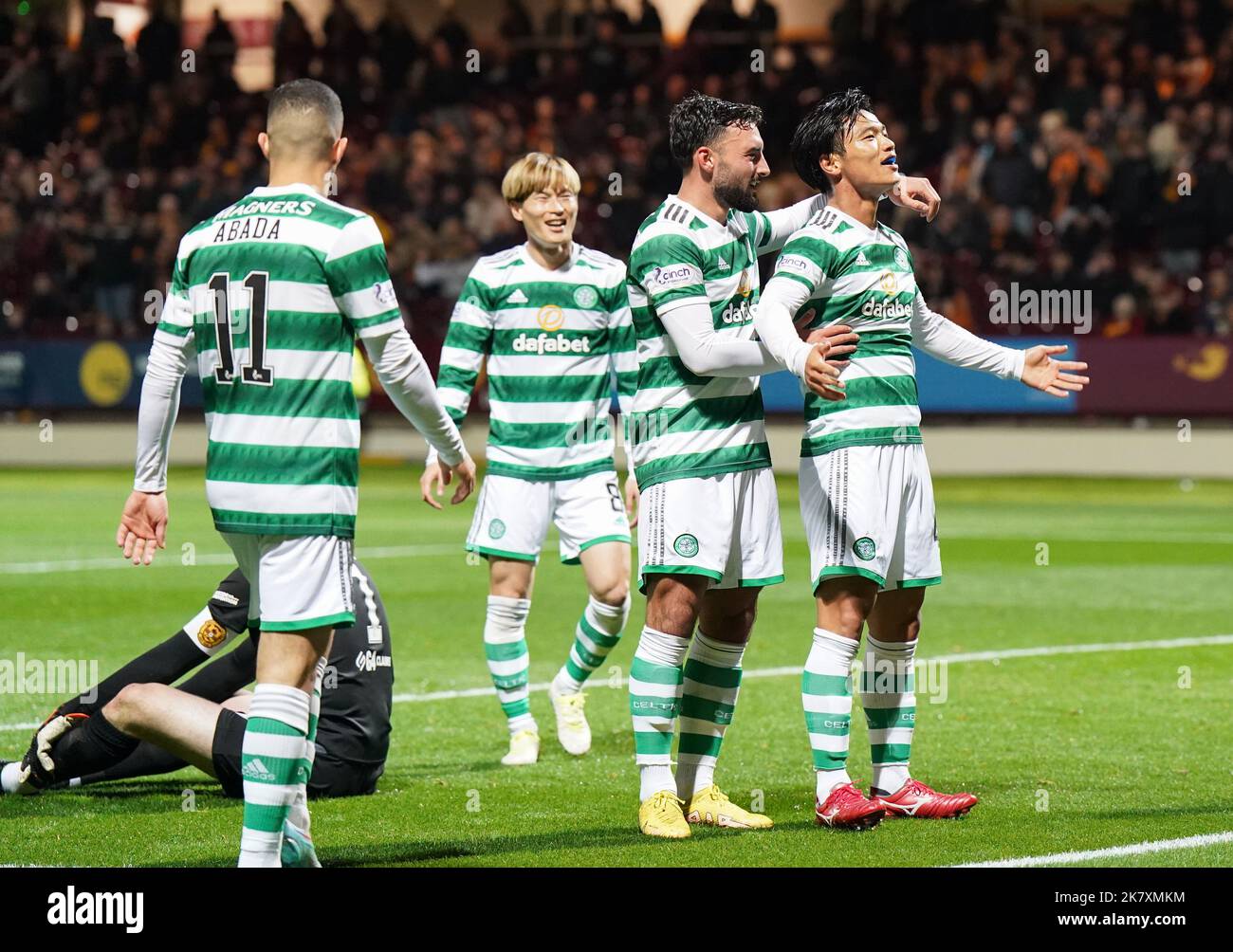 Celtic's Reo Hatate celebrates scoring their side's third goal of the ...