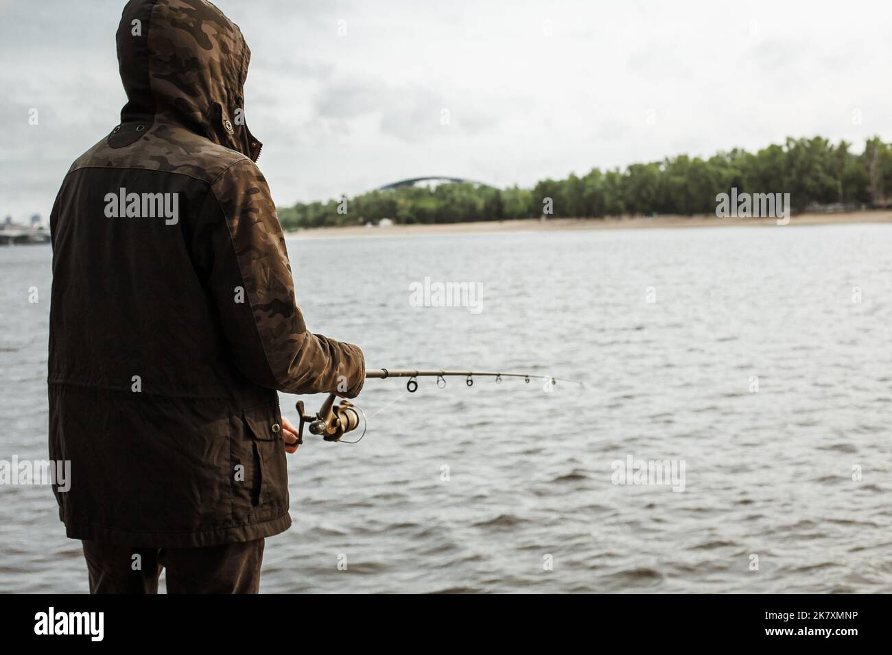 Man fishing back view hi-res stock photography and images - Alamy