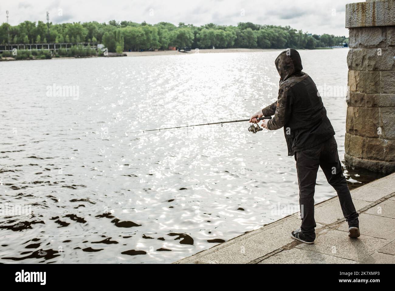 Man fishing back view hi-res stock photography and images - Alamy