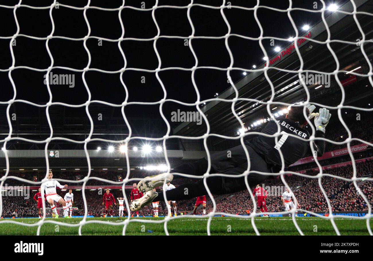 Liverpool goalkeeper Alisson Becker saves a penalty from West Ham ...