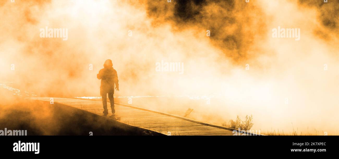 Woman on boardwalk through hi-res stock photography and images - Alamy