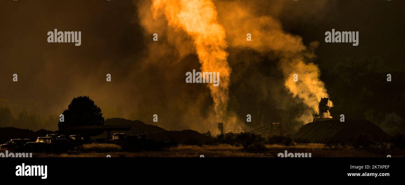 Smoke or steam rising into the air environment pollution emissions ...