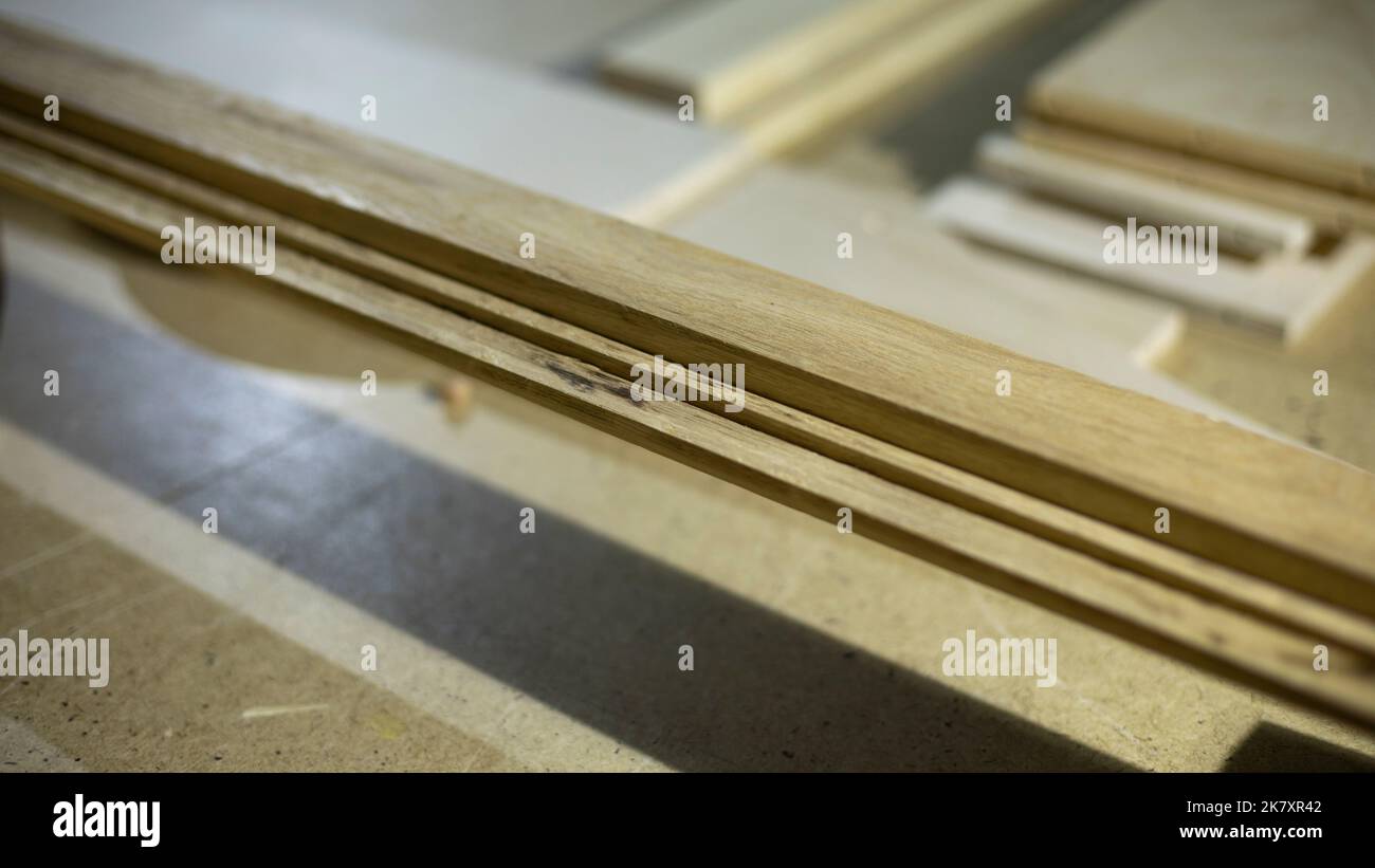 Board on table. Woodworking workshop. Details of furniture ...
