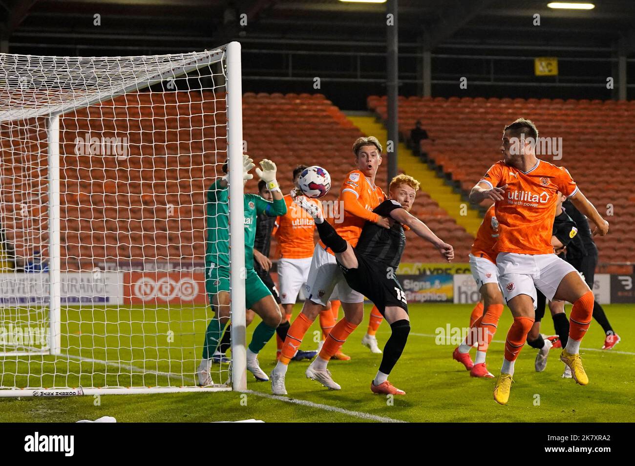 Ryan Longman #16 of Hull City flicks the ball beyond Chris Maxwell #1 ...