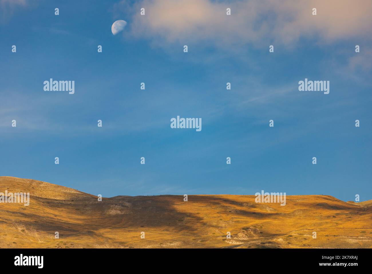 The moon over the mountain Stock Photo - Alamy