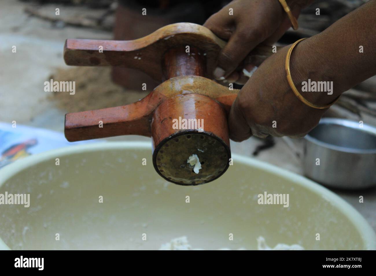 Preparing South Indian Homemade rice Murukku for Diwali festival snacks ...