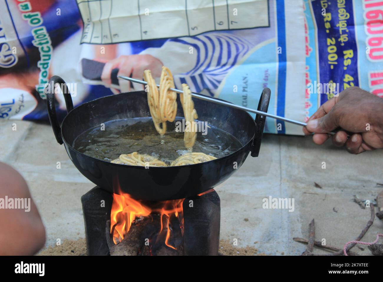 Preparing South Indian Homemade rice Murukku for Diwali festival snacks ...