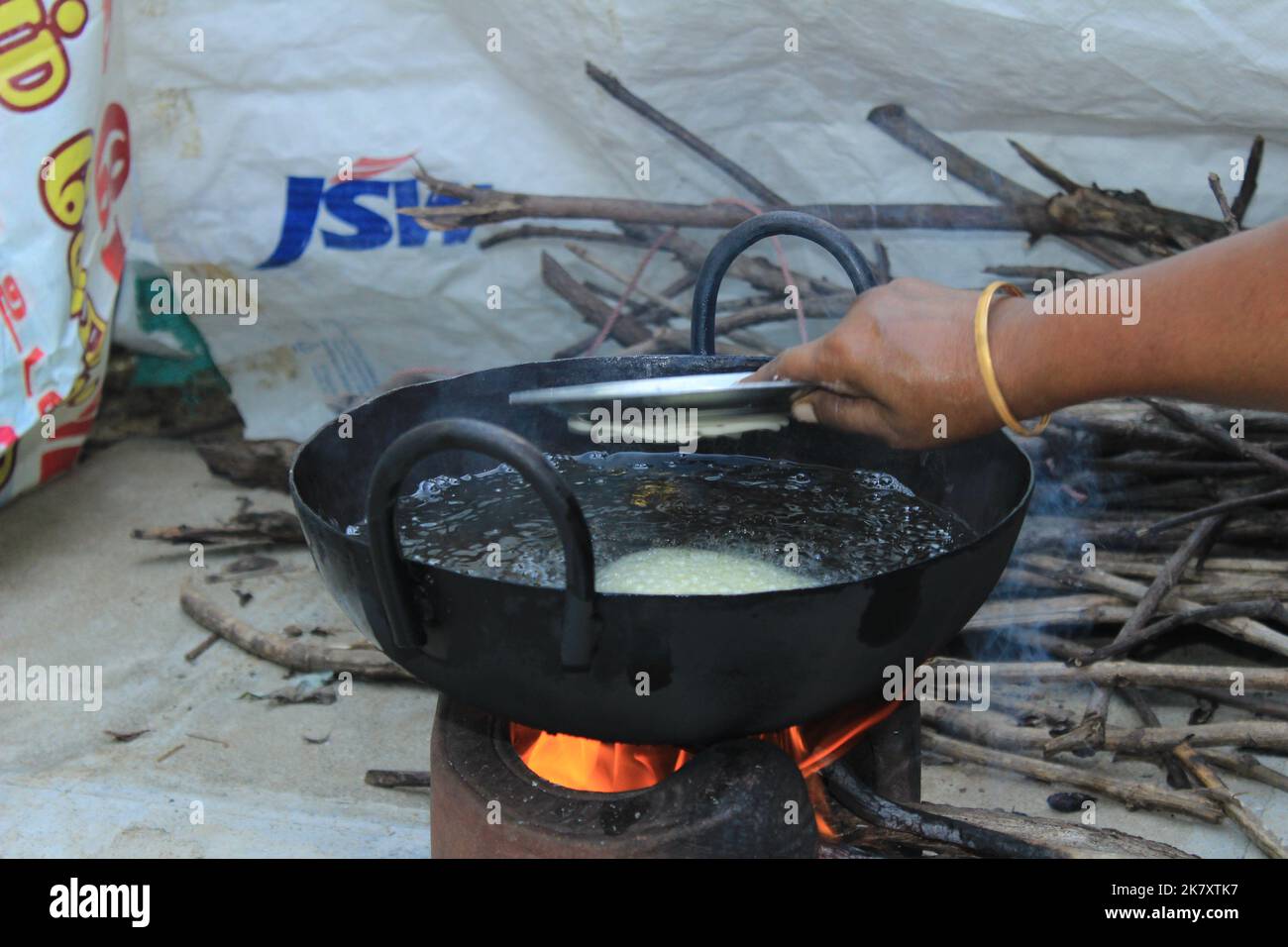 Preparing South Indian Homemade rice Murukku for Diwali festival snacks ...