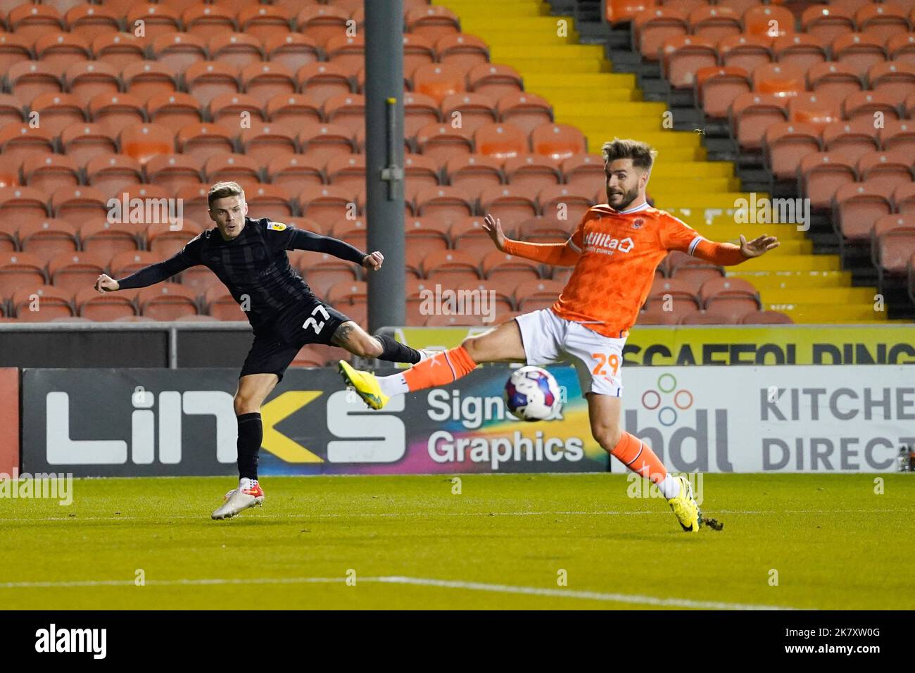 Regan Slater #27 of Hull City drives a cross past Luke Garbutt #29 of ...