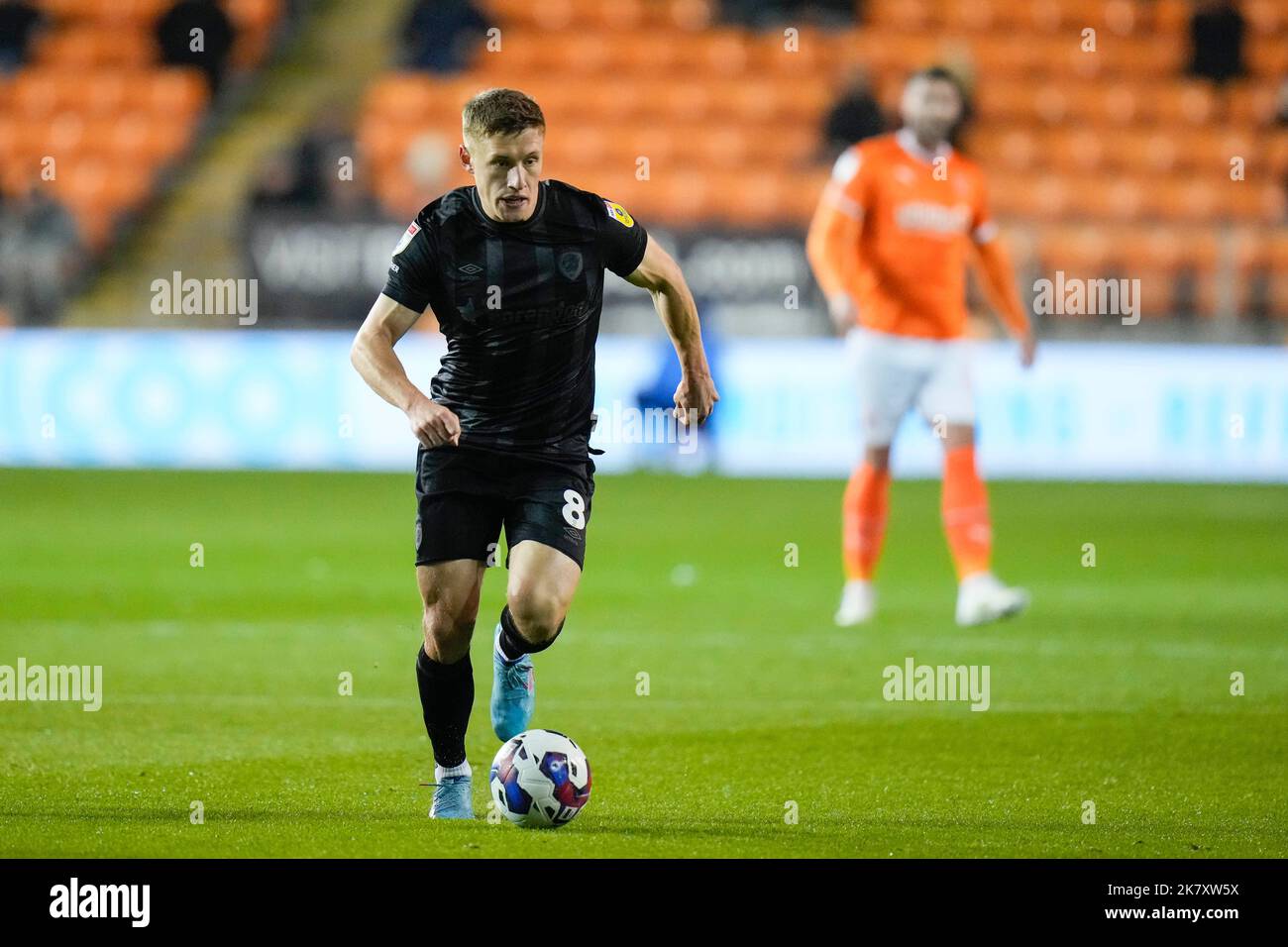 Greg Docherty #8 of Hull City runs with the ballduring the Sky Bet ...